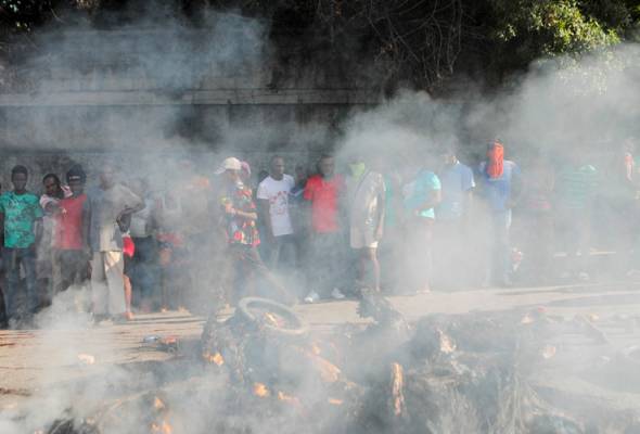 Haitian residents lynch and set fire to suspected gang members | Awani ...