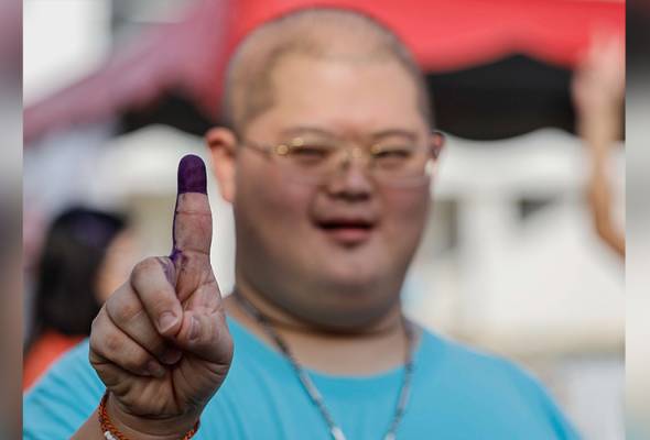 State polls: Down syndrome not stopping Wei Hoong from casting vote ...