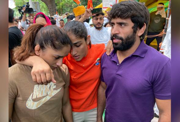 Wrestling: Indian athletes to toss medals into Ganges as they demand ...