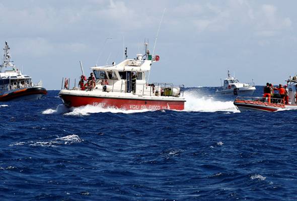 Mike Lynch and daughter among six missing after yacht sinks; divers ...